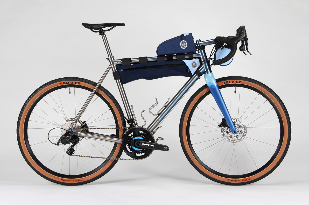 This Custom Titanium Firefly Mini Velo Fits in a Rimowa Case | The ...