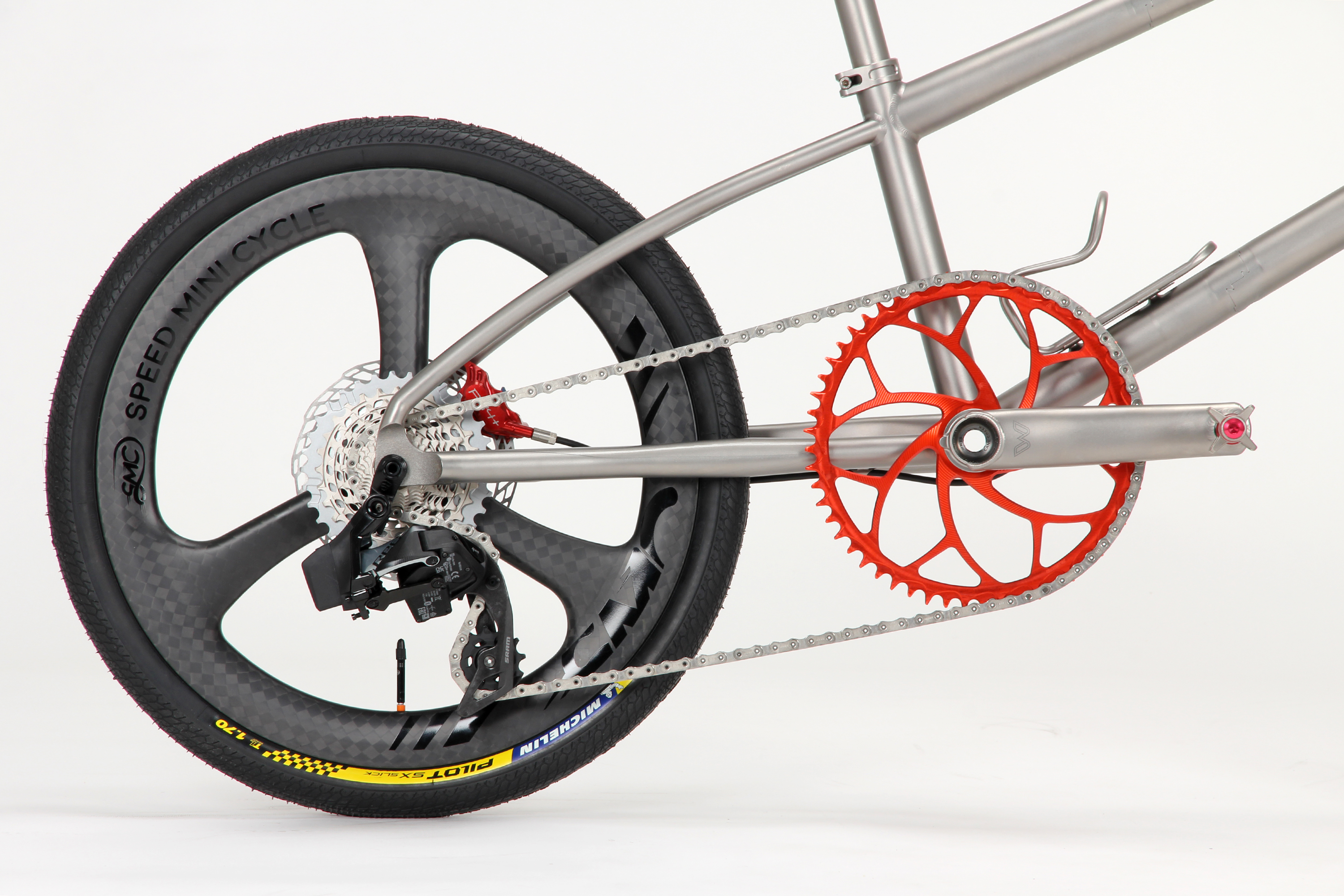 This Custom Titanium Firefly Mini Velo Fits in a Rimowa Case | The ...