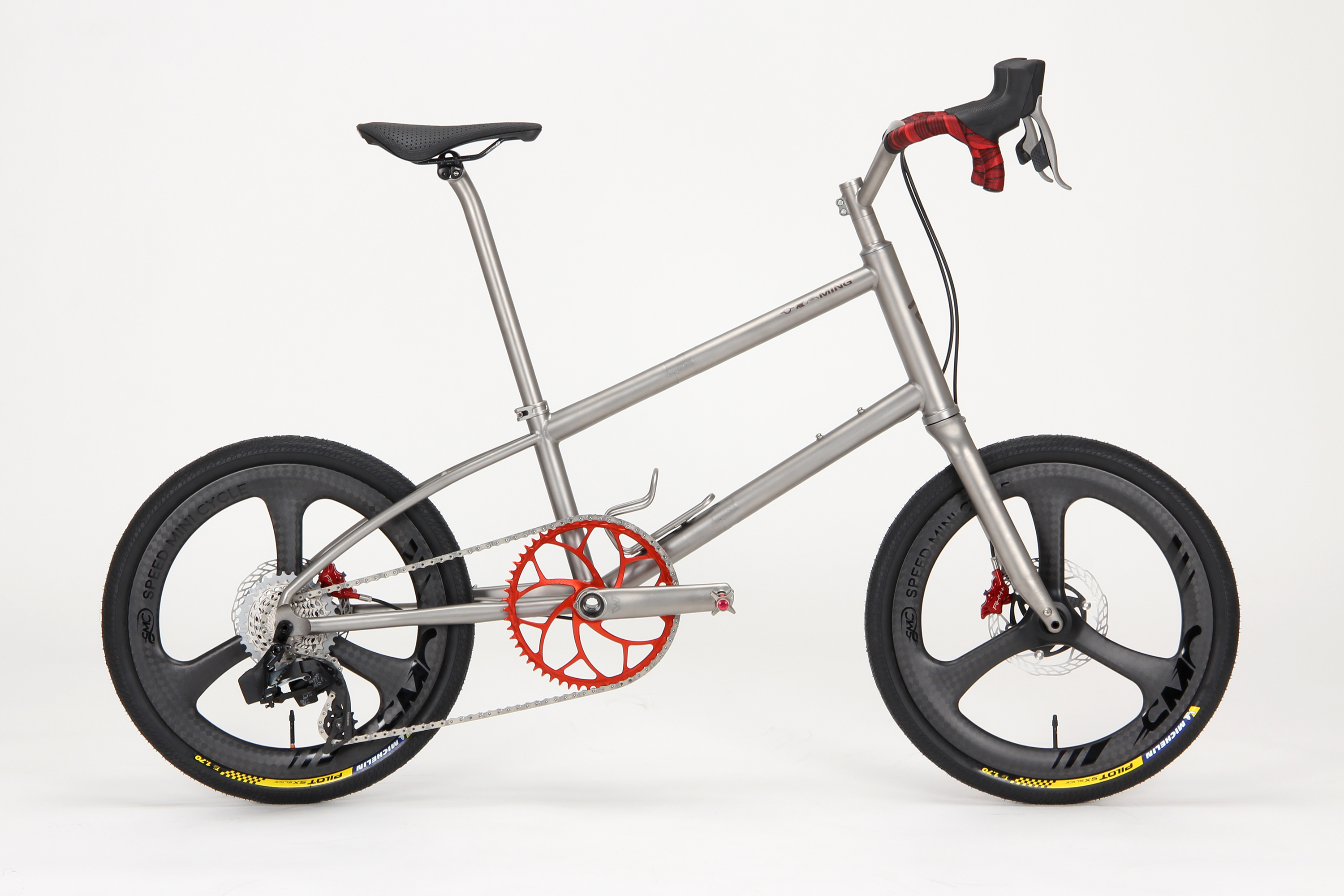 This Custom Titanium Firefly Mini Velo Fits in a Rimowa Case | The ...