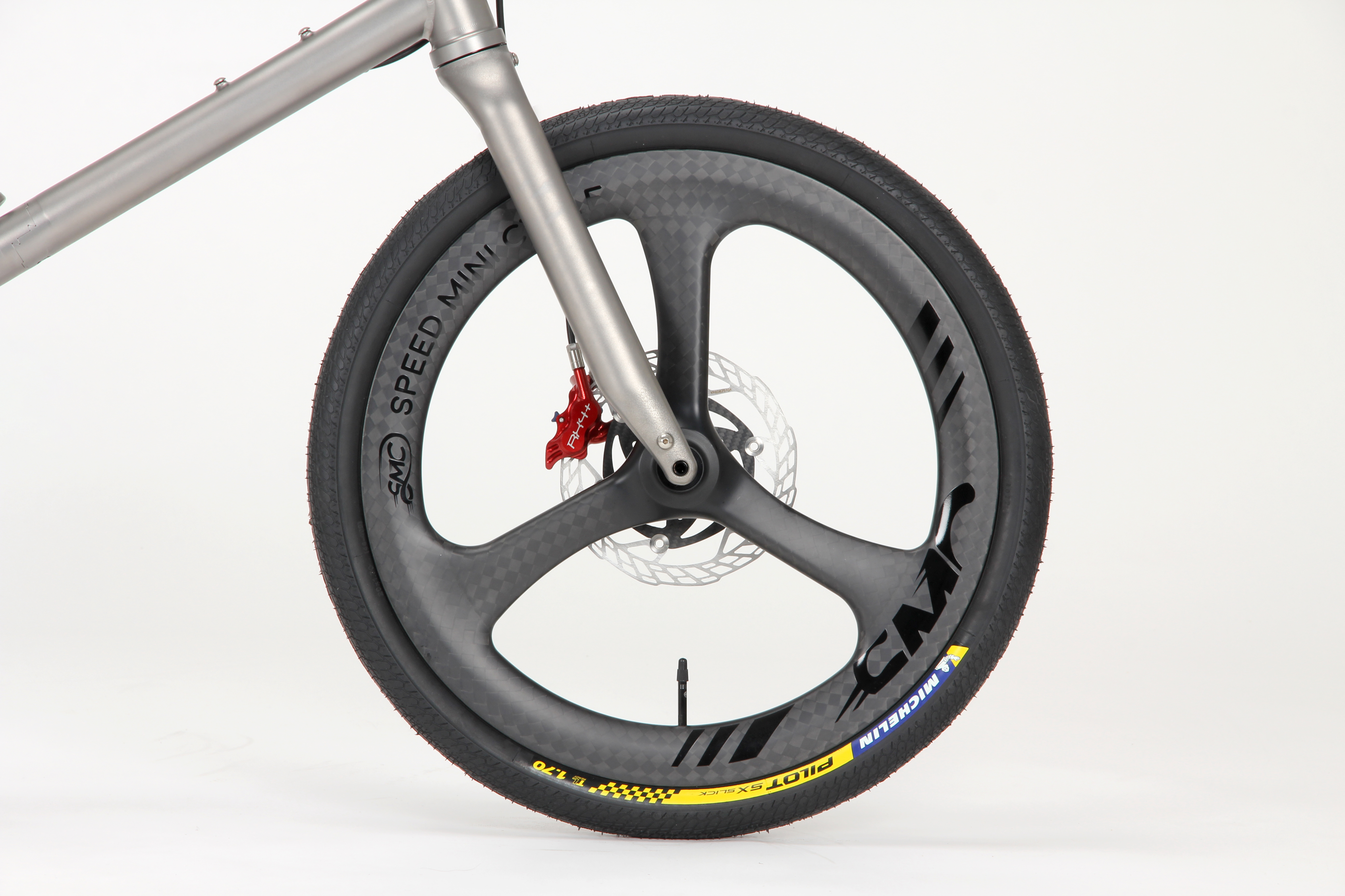 This Custom Titanium Firefly Mini Velo Fits in a Rimowa Case | The ...